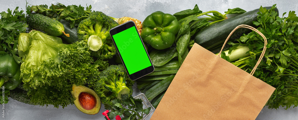 Zdjęcie Stock: Grocery shopping concept. Smartphone with blank screen ...