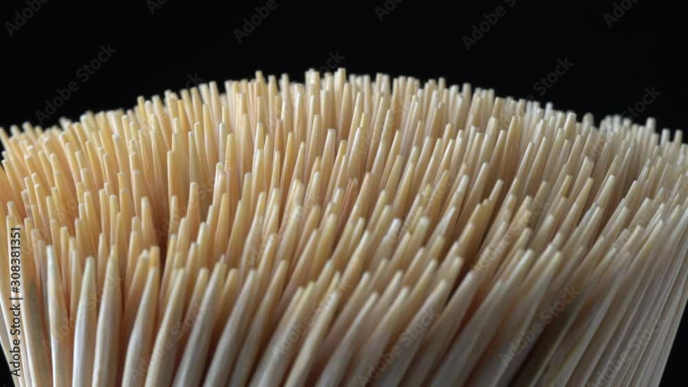 Toothpick on black background rotation. Cocktail stick or tooth pick ...