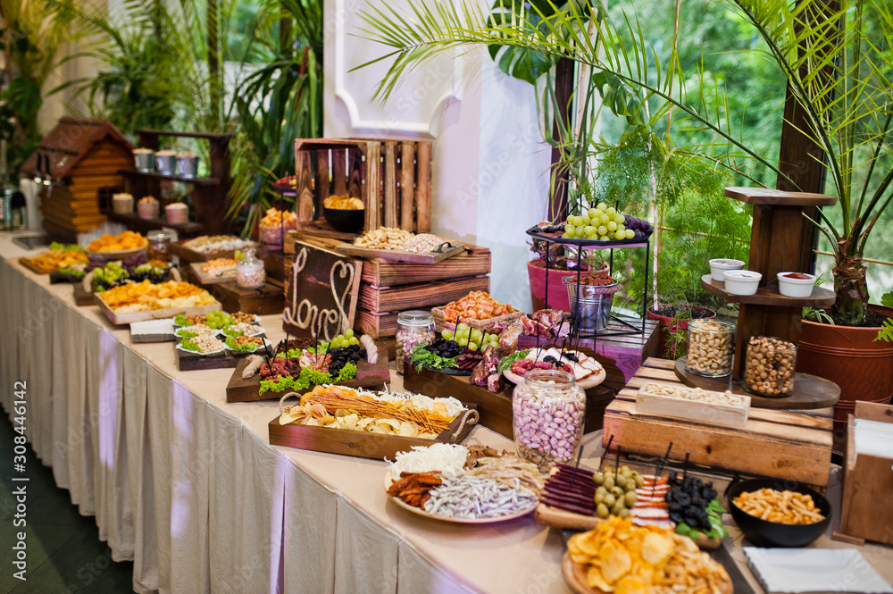 Dessert table of delicious snacks on wedding reception. Stock Photo ...
