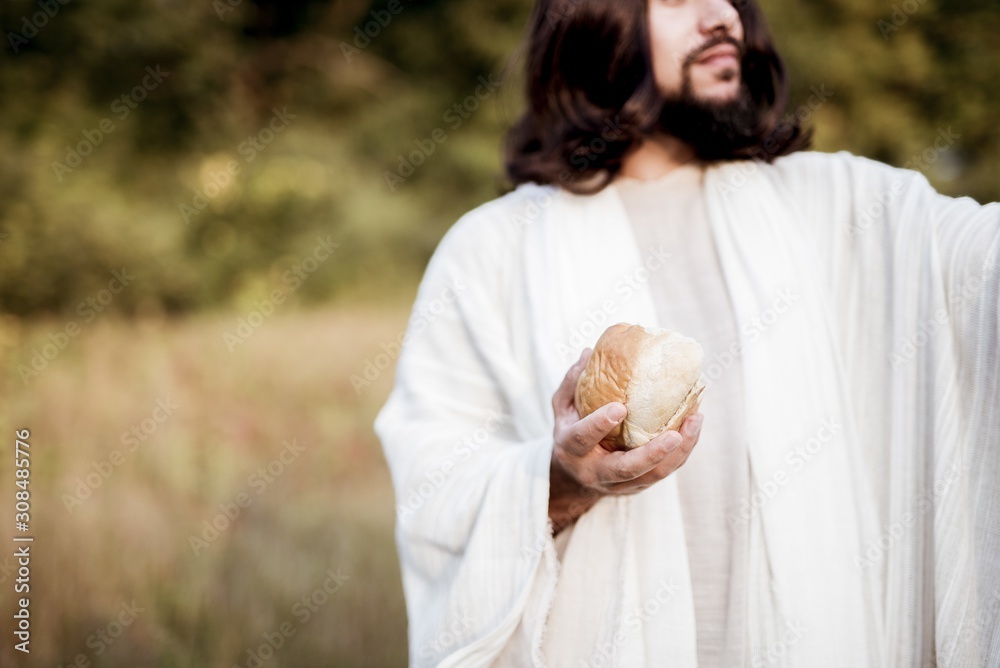 Jesus Christ giving out the sliced bread Stock Photo | Adobe Stock