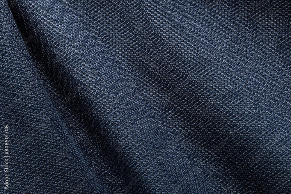 Close up shot of midnight dark blue formal suit cloth textile surface ...