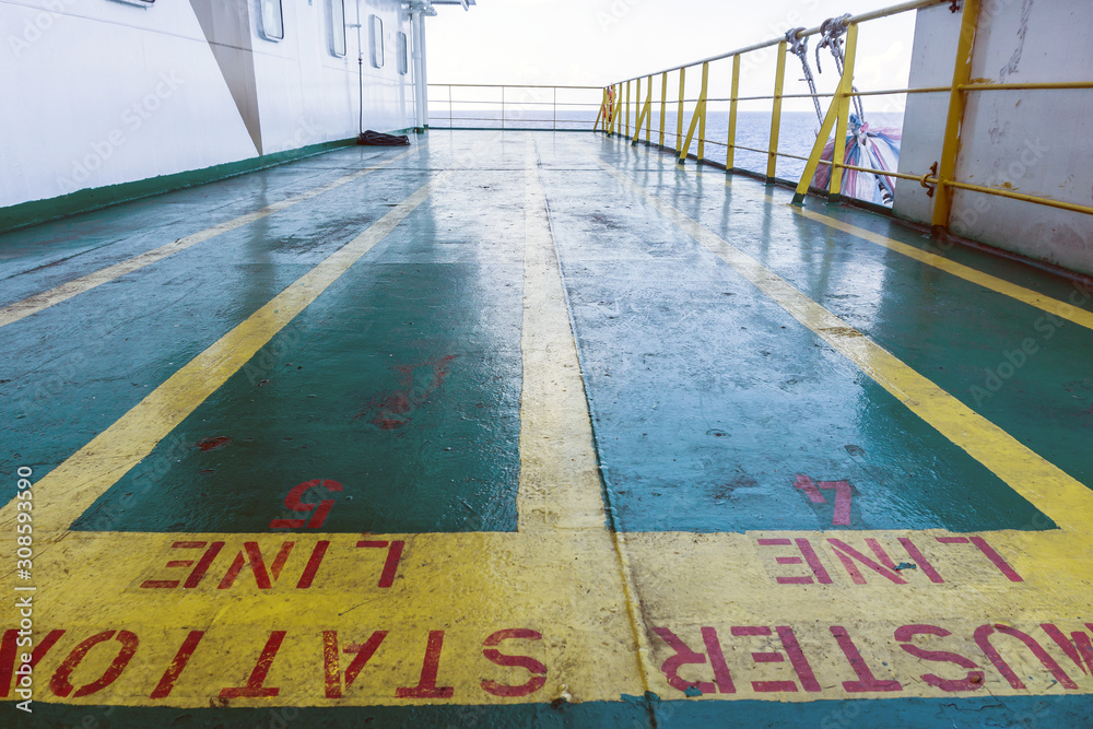 Muster station for emergency assembly on starboard side of a ...
