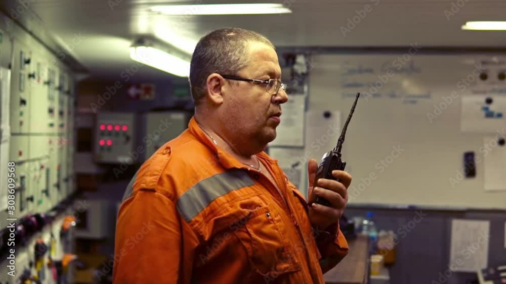Vídeo do Stock: Marine Engineer working on radio communication at ...