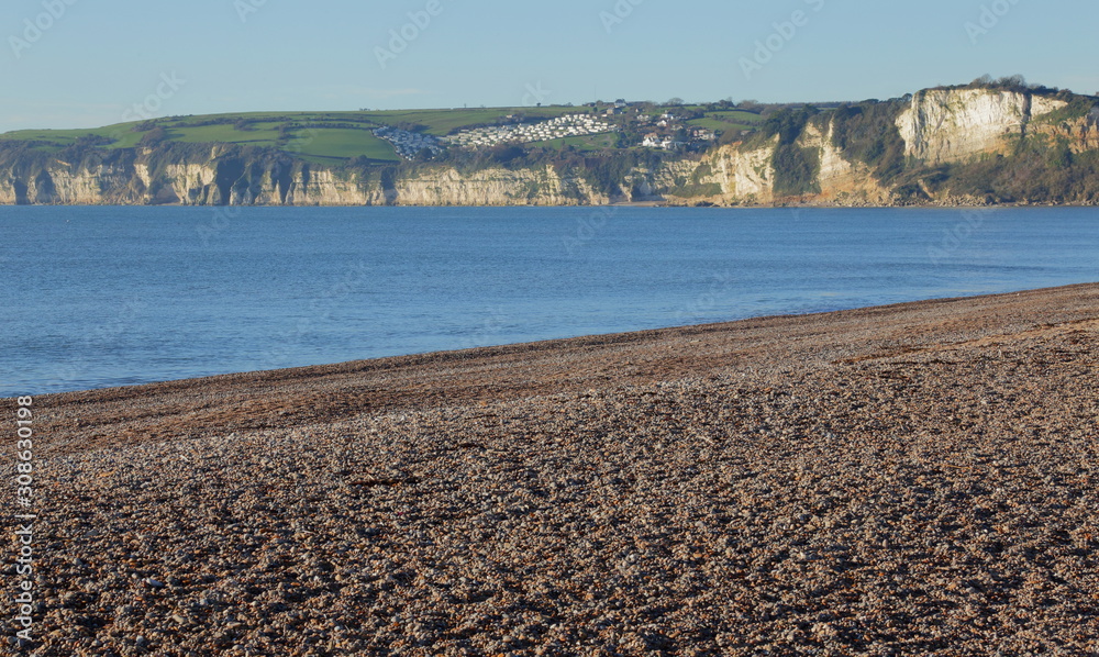 Pebble beach in town of Seaton, Devon on the Jurassic Coast Stock Photo ...