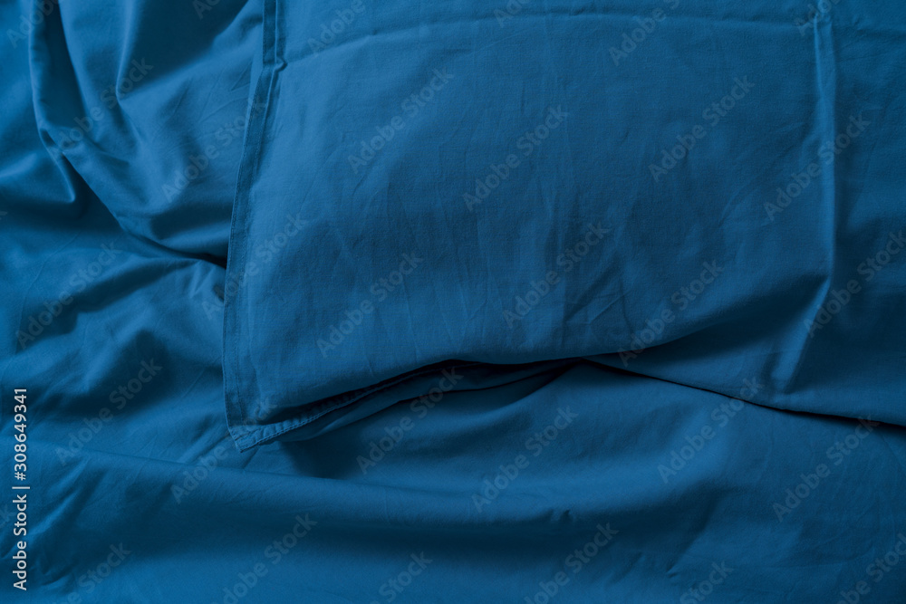 Bed linen of the blue classic color of the 2020 year. Concept of the ...