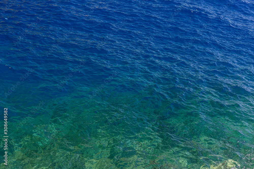 Deep blue sea water and underwater rocks near Hydra Island, Greece ...