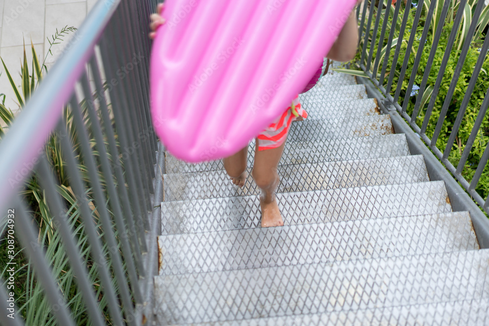 Kids enjoying in pool underwater enjoying in summer resort at pool with ...