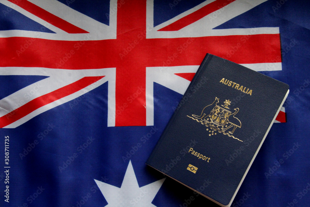 Australian Passport with the Australian national flag in the background ...