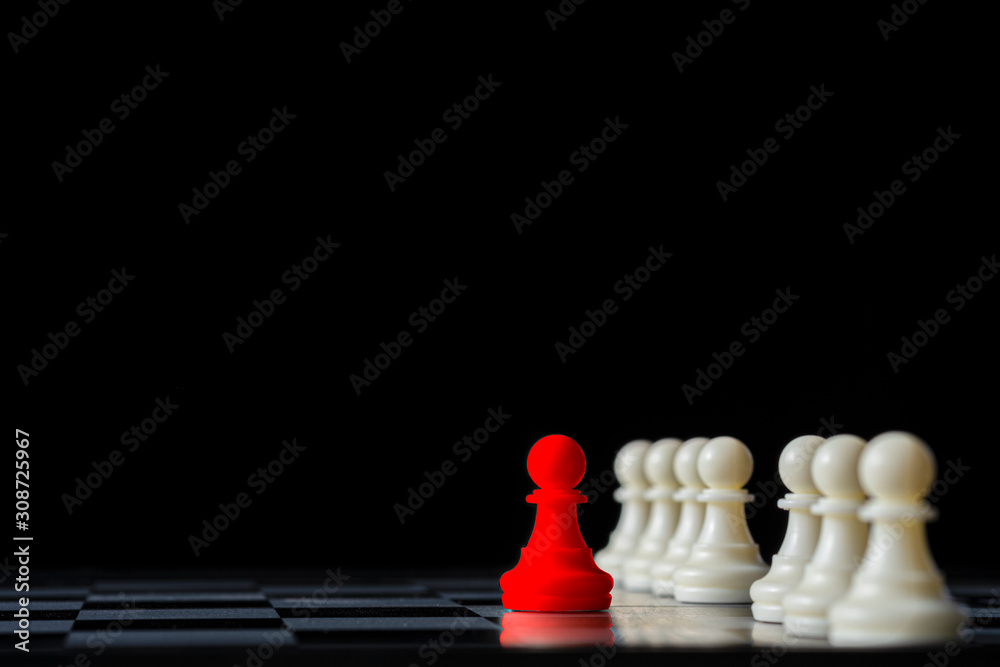 Red chess standing out from white chess on chess board and black ...