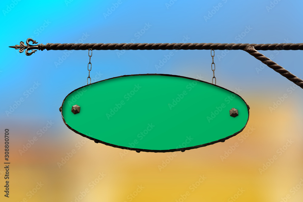 Green signboard. Green shopboard with no text hanging on a wrought iron ...