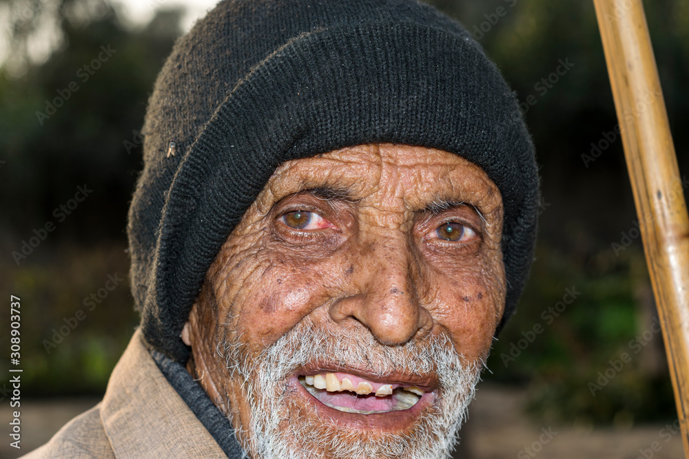 Smiling Homeless Man With Sign