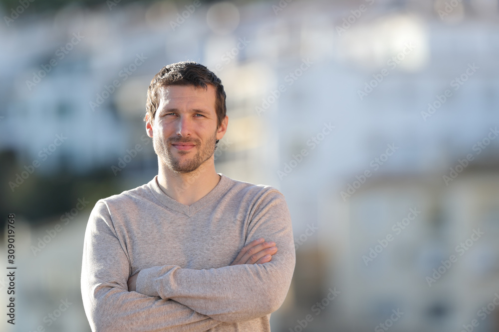 Serious adult man posing looking at camera Stock Photo | Adobe Stock