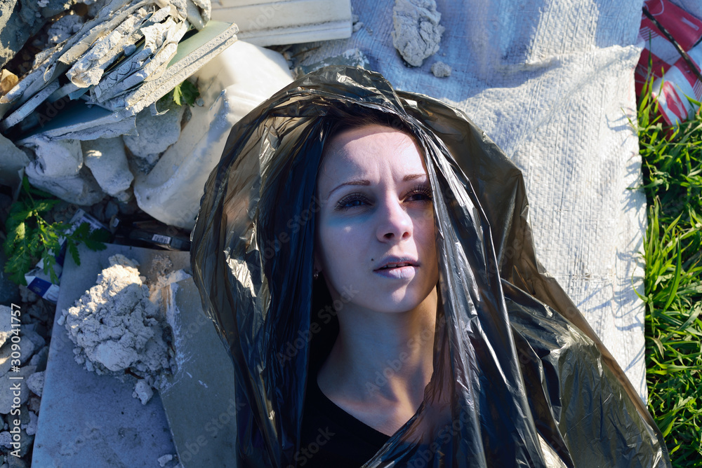corpse of a young girl lies on a landfill Stock Photo | Adobe Stock