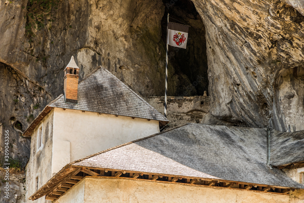 Predjama, Slovenia. The Predjamski Grad or Predjama Castle, a ...