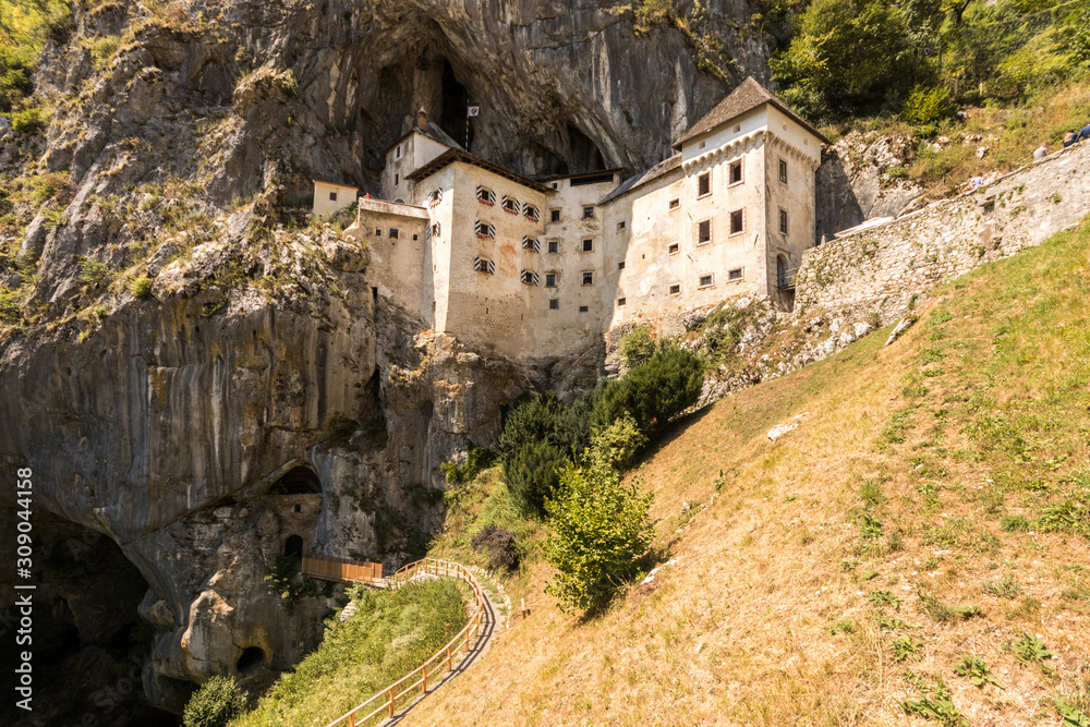 Predjama, Slovenia. The Predjamski Grad or Predjama Castle, a ...