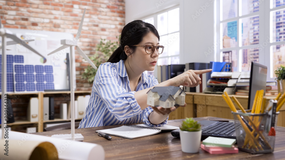 Female architectural designer work on laptop computer. engineering new ...