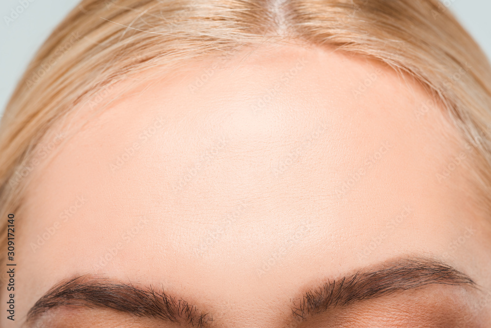 close up of forehead with perfect skin of young woman Stock Photo ...