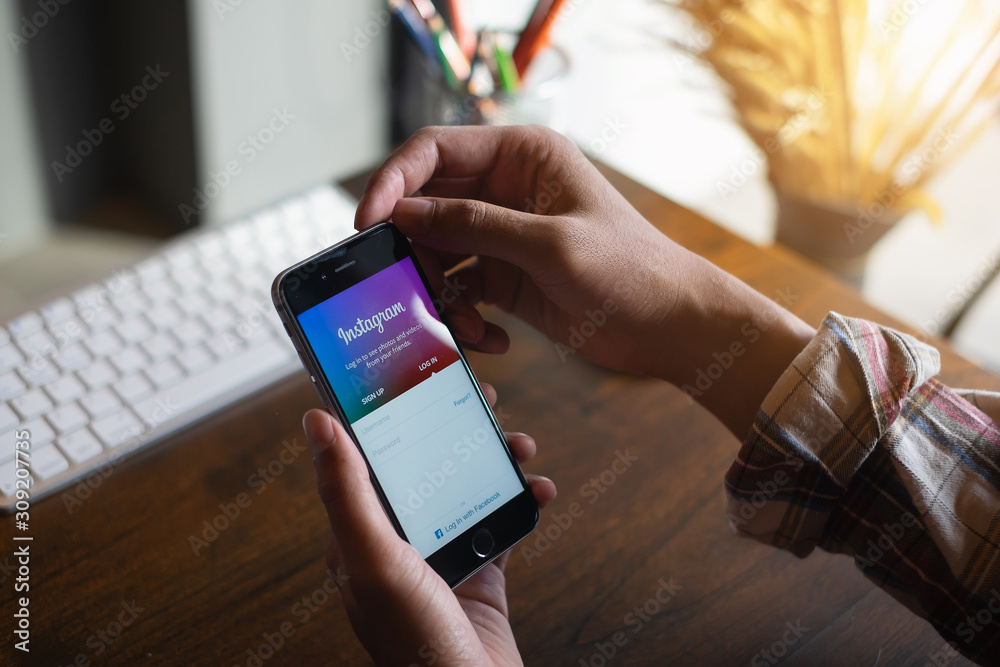 CHIANG MAI, THAILAND - JULY 05, 2018: Man hand holding iphone with ...