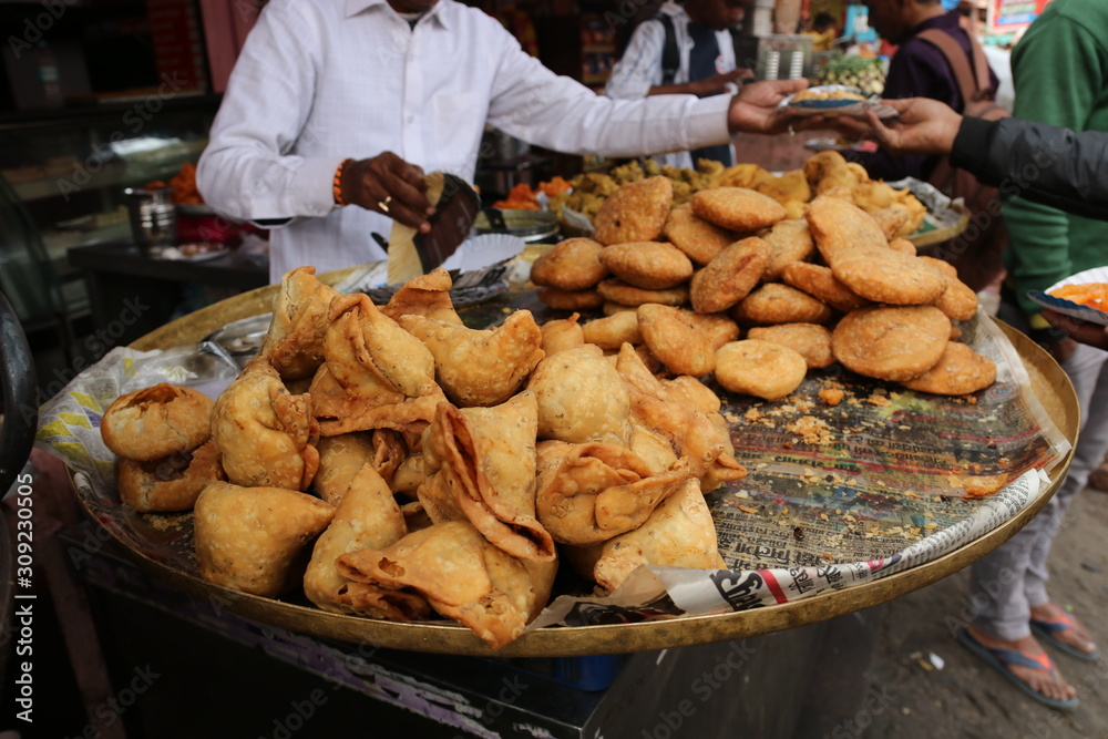 Street food in Jaipur, India. Traditional indian food - samosa and ...