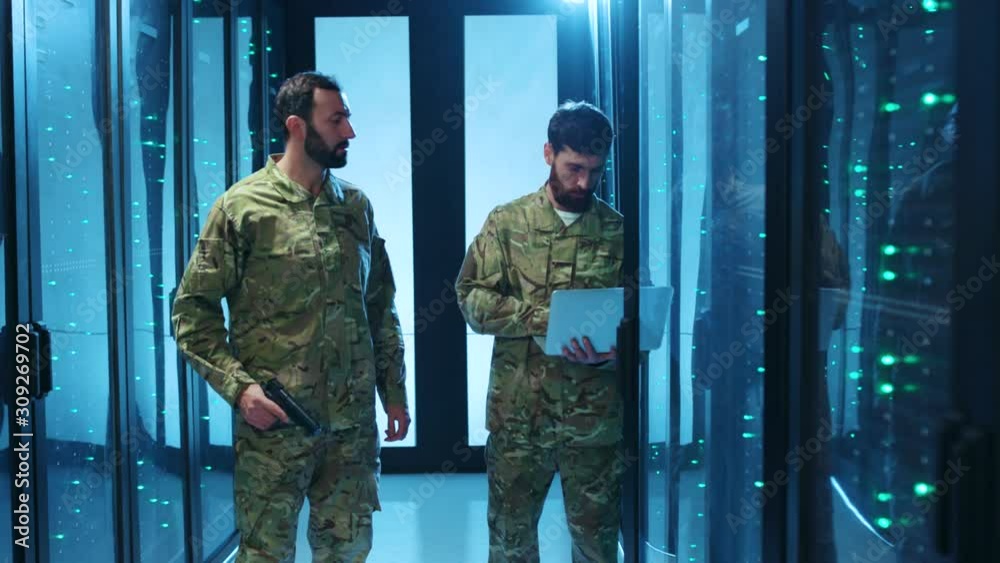 Security alarm in database. Two armed dangerous military men on spy ...