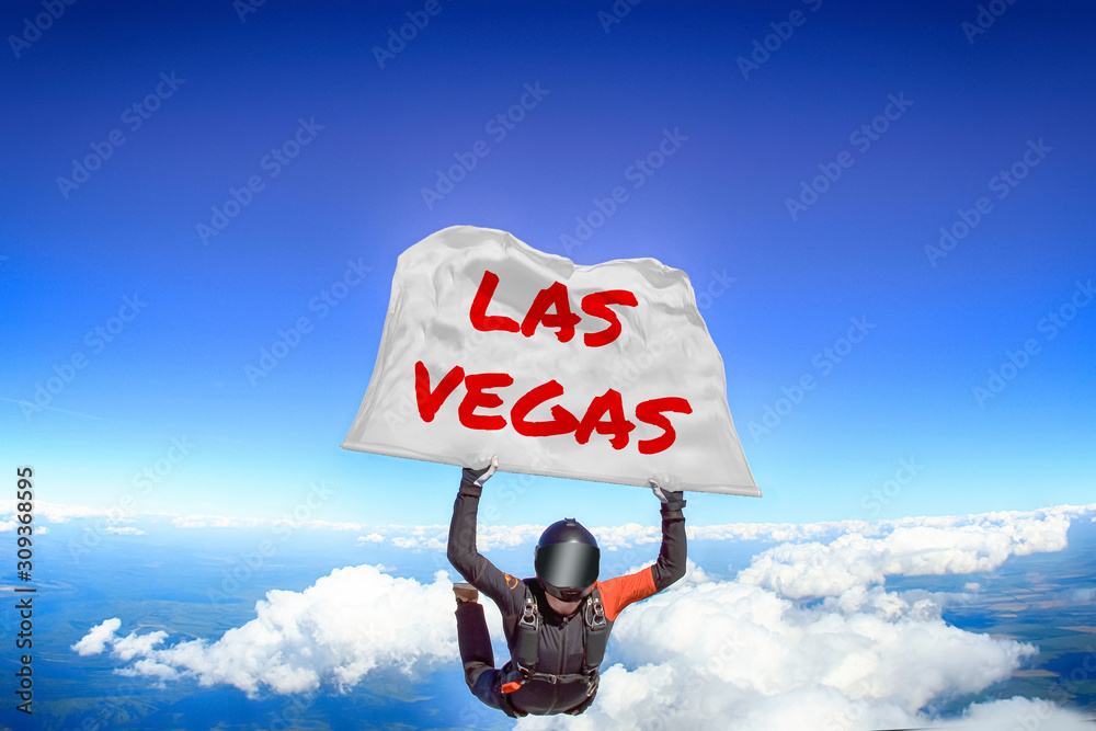 Las Vegas. Flag in skydiving. People in free fall.Teampleat skydiver ...