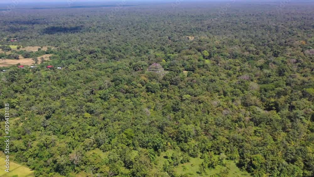 Ancient khmer pyramid in Koh Ker, Cambodia with blue sky and clouds ...
