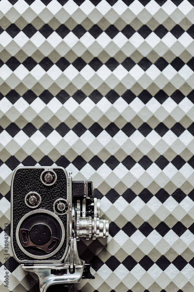 8mm camera on geometric background Stock Photo | Adobe Stock