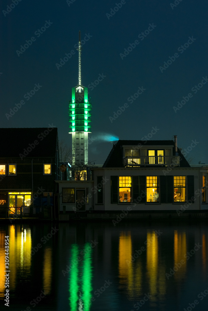 Classic dutch houses along the river Rhine in the town of Alphen aan ...