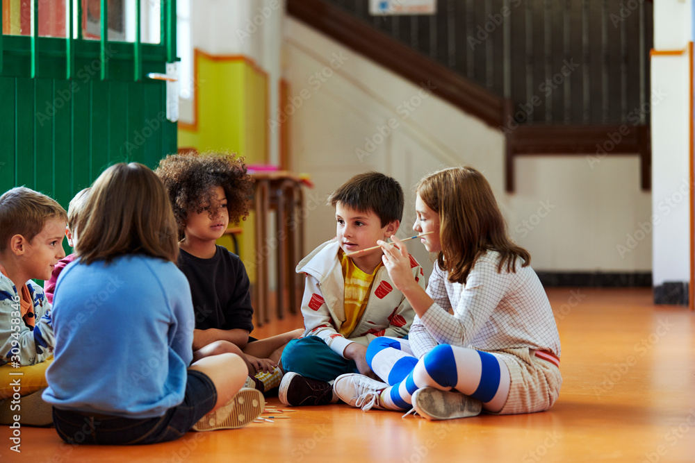 Schoolkids playing on the school floor Stock Photo | Adobe Stock