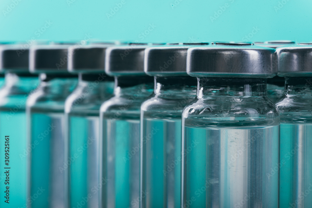 Glass medical ampoule vial for injection. Medicine is liquid sodium ...