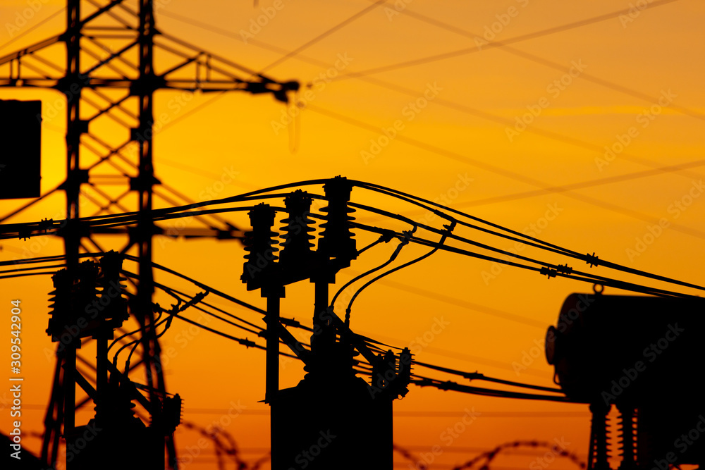 electrical substation at sunset. Stock Photo | Adobe Stock