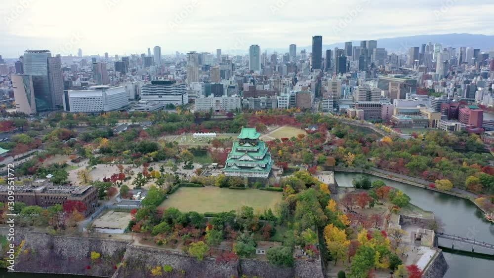 Aerial view 4k by drone of Osaka castle and building city at Osaka ...