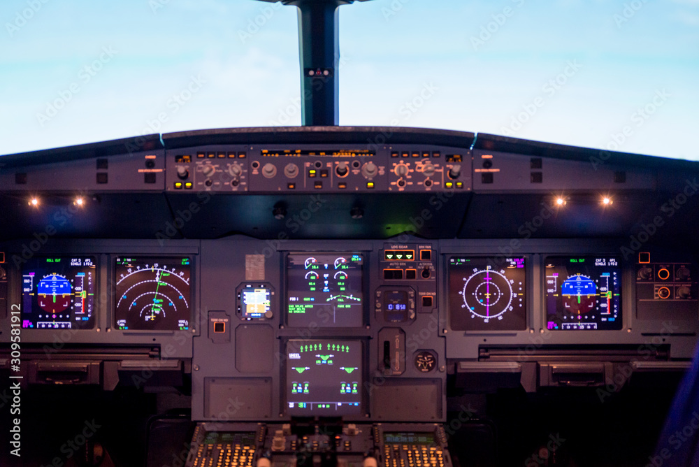 Airplane buttons in the cockpit simulator Stock Photo | Adobe Stock