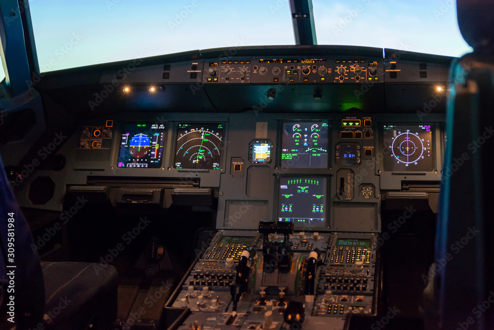 Airplane buttons in the cockpit simulator Stock Photo | Adobe Stock