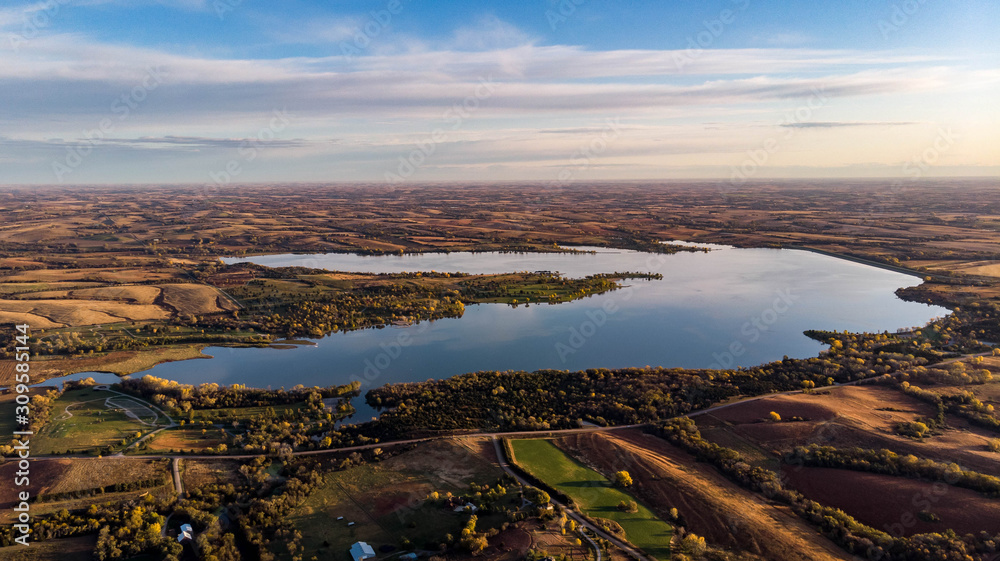 Autumn sunrise over Branched Oak Recreation Area and surrounding trees ...