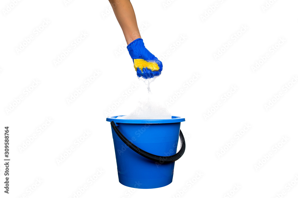 Plastic blue water bucket with soapsuds and black handle. Cleaning ...