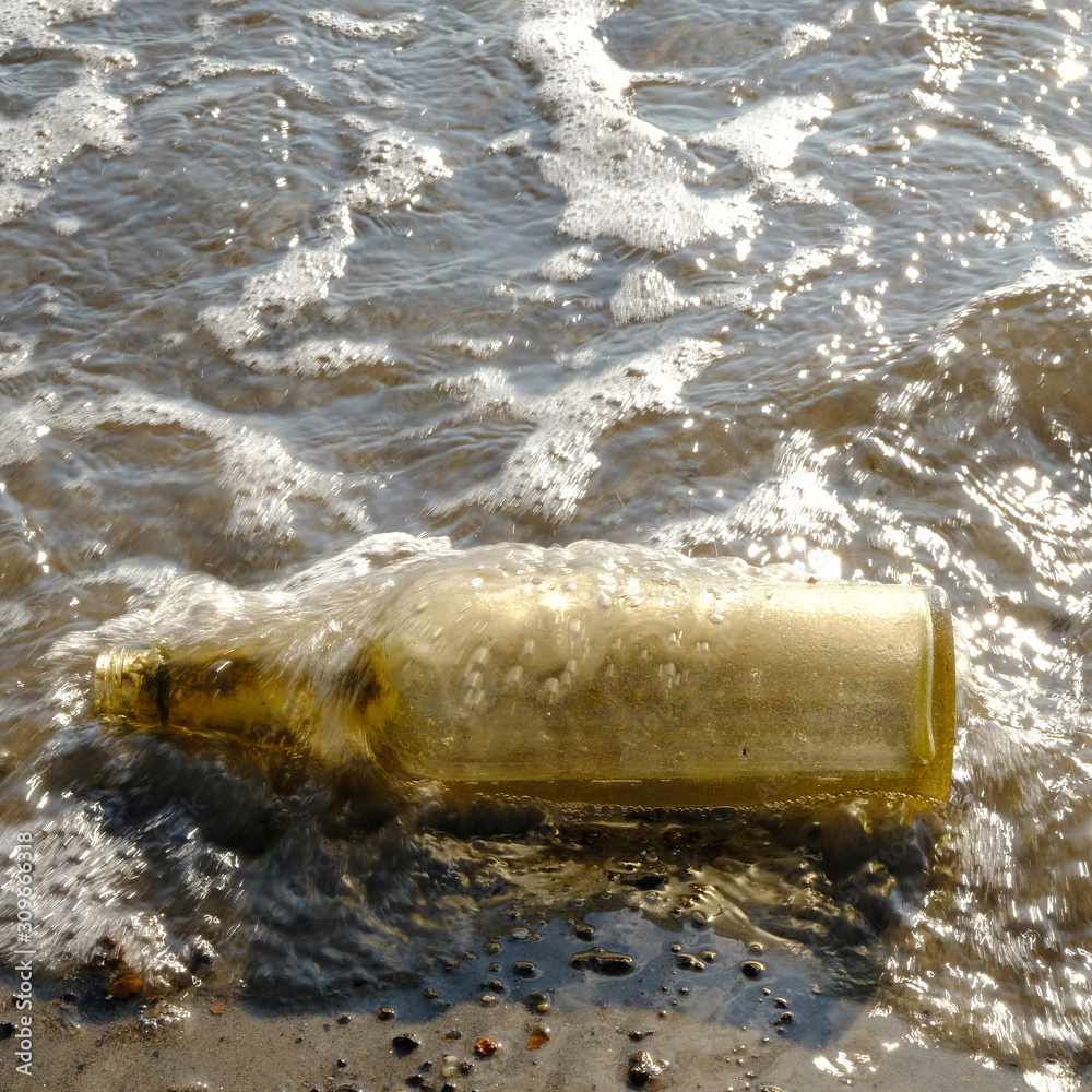 Washed up Bottle on the beach at Dead Horse Bay/Glass Bottle Beach ...