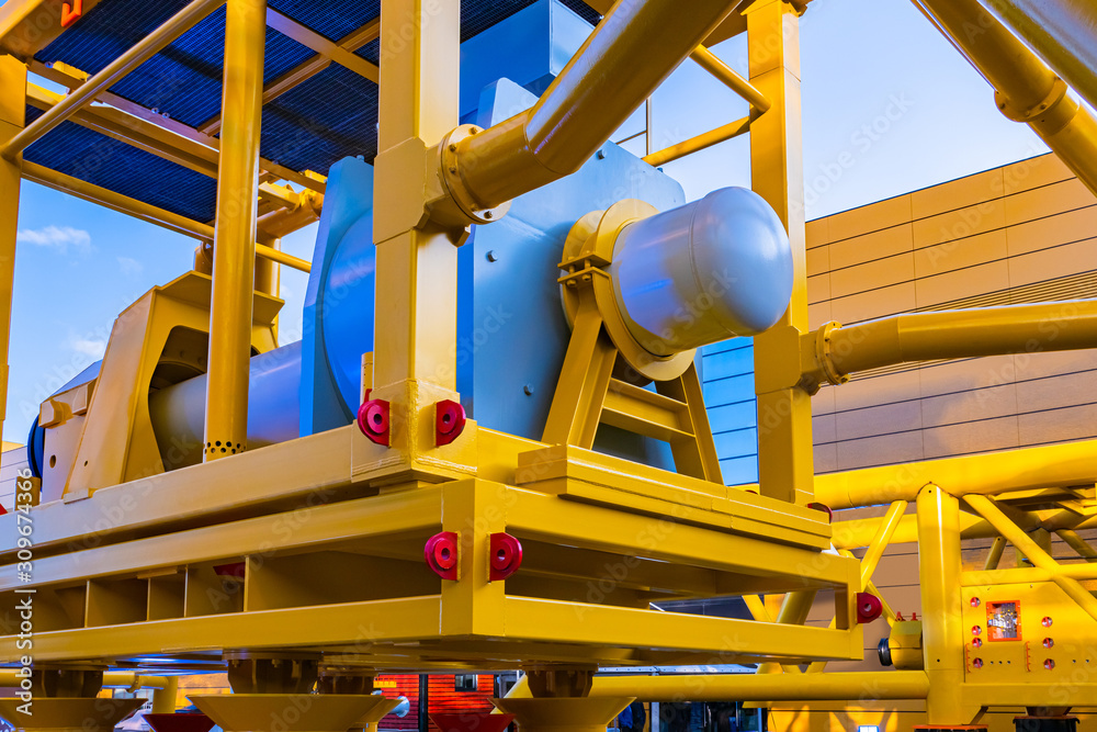 Chemical industry. Pipes of a chemical plant on the background of the ...