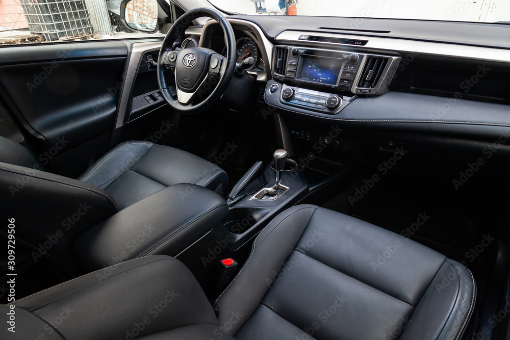 The interior of the car Toyota Rav4 with a view of the steering wheel ...