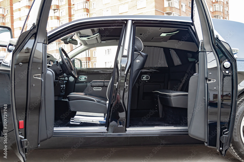Interior view of new a very expensive car, a long black limousine with ...