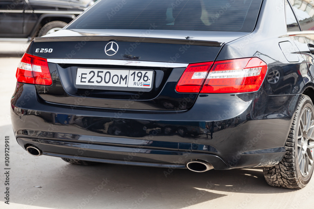 Black Mercedes Benz E-class E250 2010 year Rear view with dark gray ...