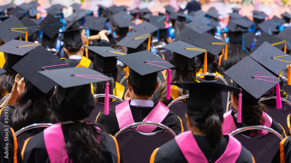 Rear view and soft selective focus of the graduates in the graduation ...