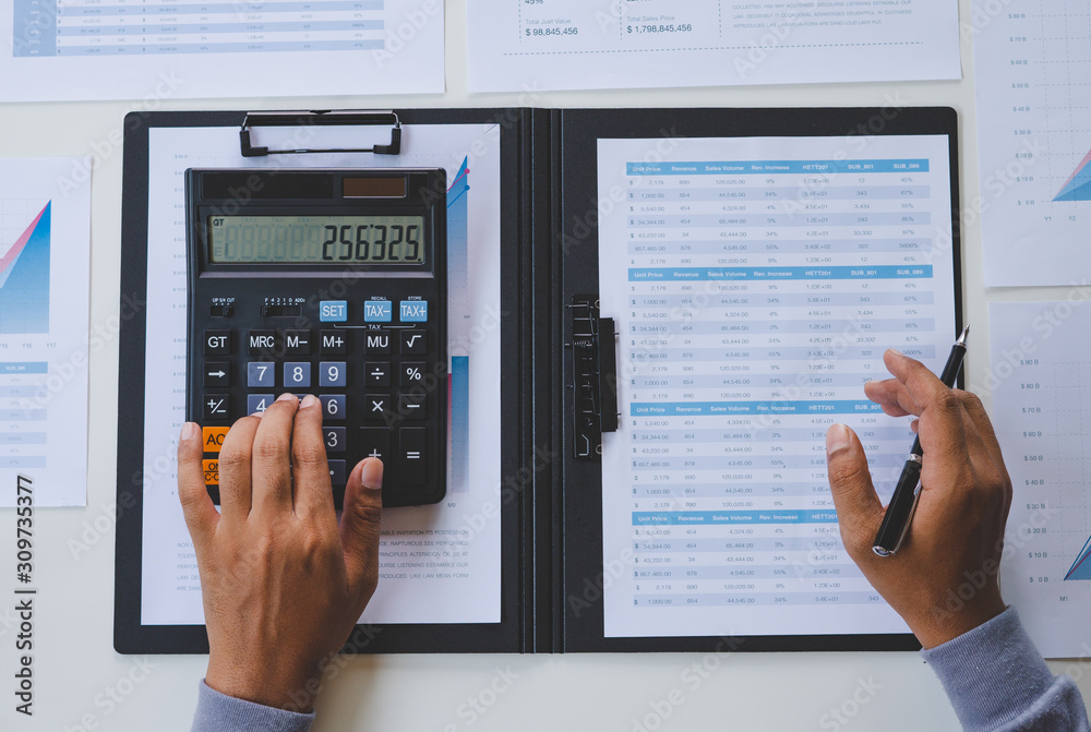 businessman working calculate data document graph chart report ...