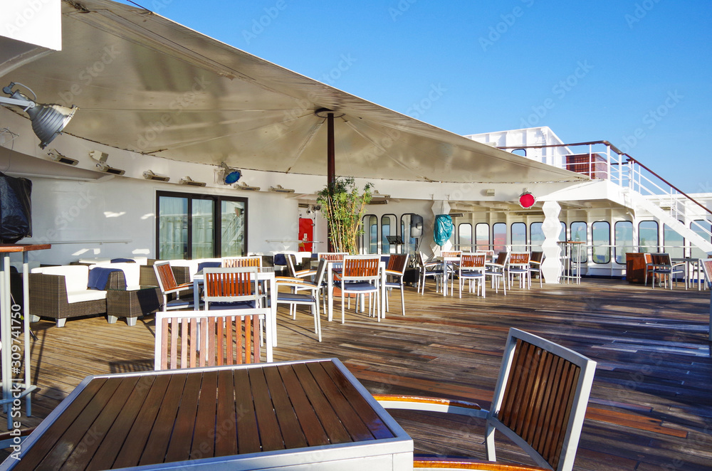 Outdoor Pool bar lounge with exclusive furniture and wooden deck ...