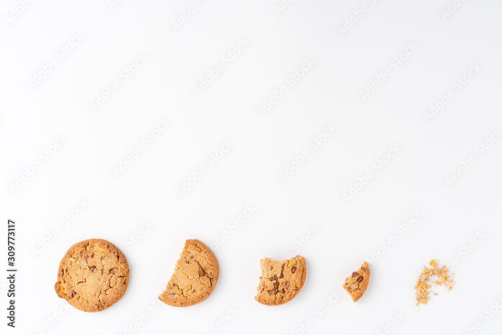 Sequence of chocolate chip cookies being devoured isolated on white ...