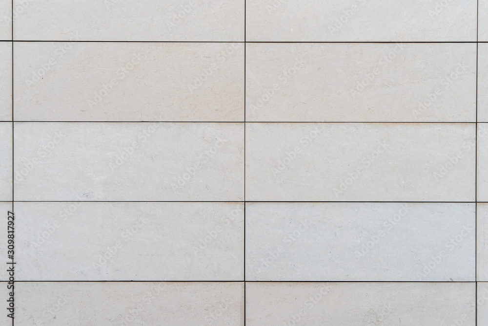Texture of gray rectangular porcelain tiles. Building facade background ...
