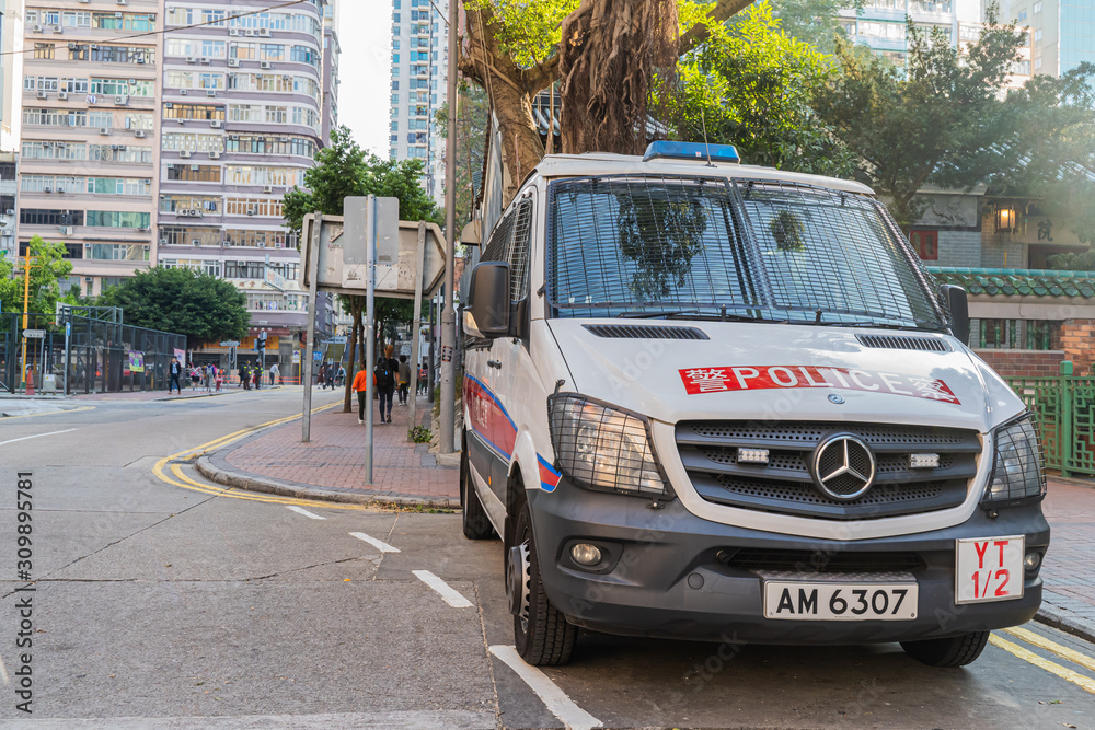 HONG KONG, CHINA - Hong Kong police vehicle on duty on Nathan Road in ...
