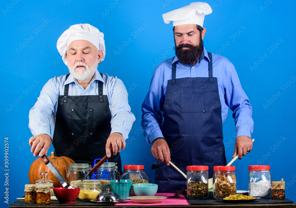 Chef men cooking. Father and son culinary hobby. Family restaurant ...