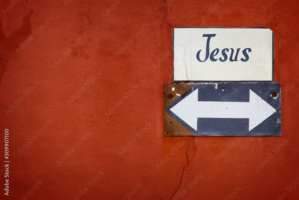Jesus arrow sign on cracked wall Stock Photo | Adobe Stock