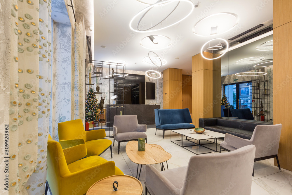 Foto de Interior of a hotel lobby with reception desk do Stock | Adobe ...